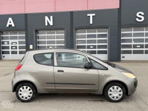 Brown Mitsubishi Colt 2009 in Panevezys, with an engine capacity of 1.30 L and mileage of 90 thousand km for 330 €, photo 5 on AUTOMOTO.COM.LV