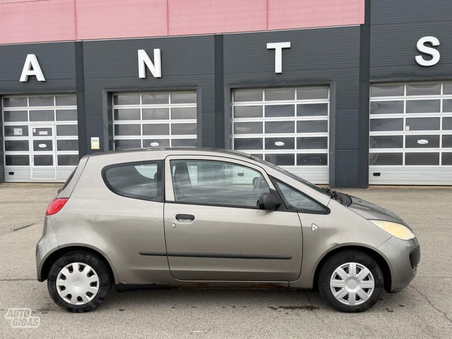 Brown Mitsubishi Colt 2009 in Panevezys, with an engine capacity of 1.30 L and mileage of 90 thousand km for 330 €, photo 5 on AUTOMOTO.COM.LV