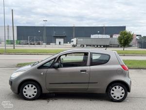 Brown Mitsubishi Colt 2009 in Panevezys, with an engine capacity of 1.30 L and mileage of 90 thousand km for 330 €, photo 6 on AUTOMOTO.COM.LV