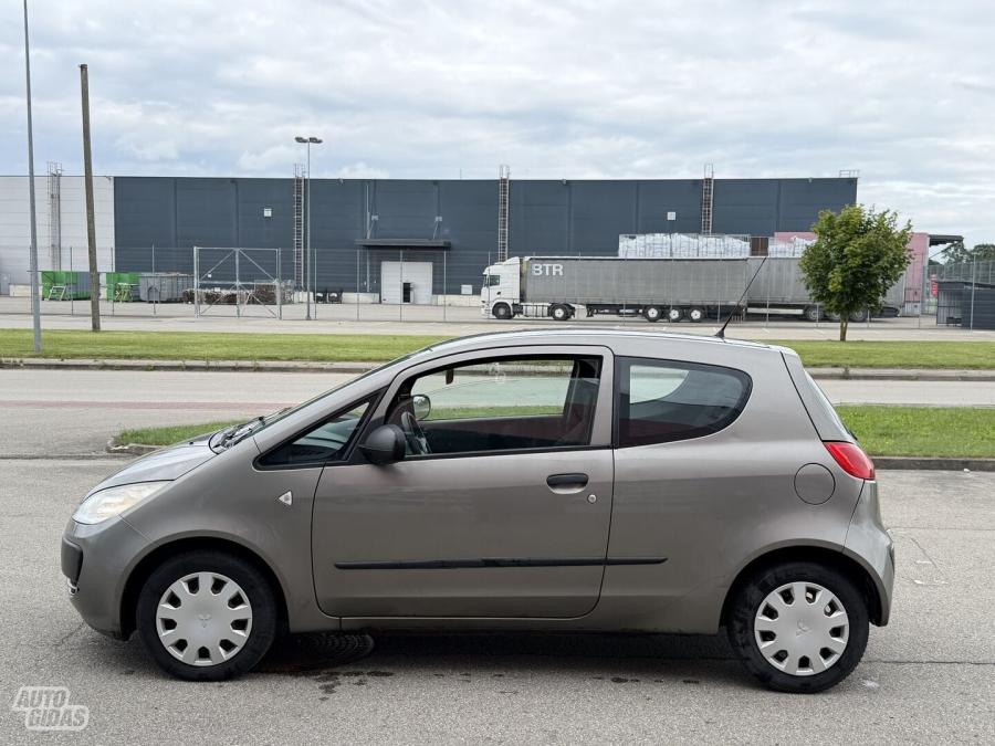 Brown Mitsubishi Colt 2009 in Panevezys, with an engine capacity of 1.30 L and mileage of 90 thousand km for 330 €, photo 6 on AUTOMOTO.COM.LV