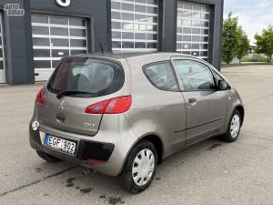 Brown Mitsubishi Colt 2009 in Panevezys, with an engine capacity of 1.30 L and mileage of 90 thousand km for 330 €, photo 7 on AUTOMOTO.COM.LV