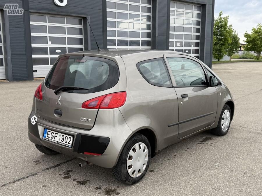 Brown Mitsubishi Colt 2009 in Panevezys, with an engine capacity of 1.30 L and mileage of 90 thousand km for 330 €, photo 7 on AUTOMOTO.COM.LV