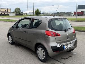 Brown Mitsubishi Colt 2009 in Panevezys, with an engine capacity of 1.30 L and mileage of 90 thousand km for 330 €, photo 9 on AUTOMOTO.COM.LV
