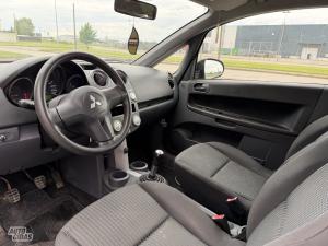 Brown Mitsubishi Colt 2009 in Panevezys, with an engine capacity of 1.30 L and mileage of 90 thousand km for 330 €, photo 10 on AUTOMOTO.COM.LV