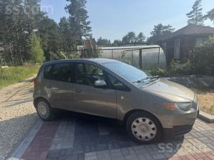 Brūns Mitsubishi Colt 2012 Rīga, ar dzinēja tilpumu 1.30 L un nobraukumu 222 tūkst. km par 2000 €, foto  vietnē AUTOMOTO.COM.LV