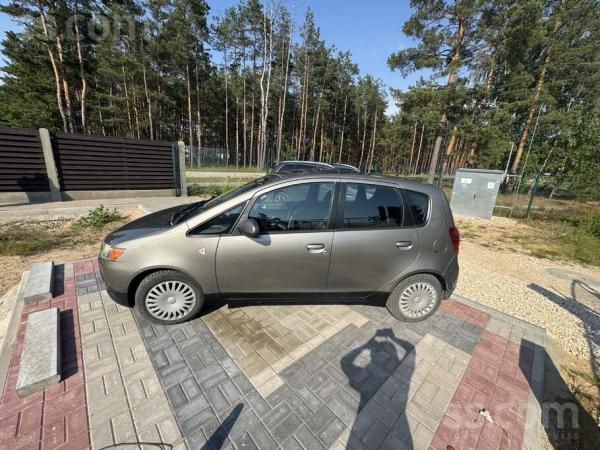 Brūns Mitsubishi Colt 2012 Rīga, ar dzinēja tilpumu 1.30 L un nobraukumu 222 tūkst. km par 2000 €, foto 3 vietnē AUTOMOTO.COM.LV