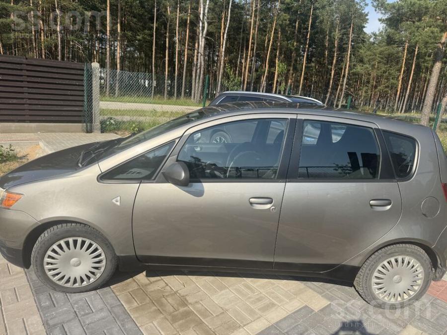 Brūns Mitsubishi Colt 2012 Rīga, ar dzinēja tilpumu 1.30 L un nobraukumu 222 tūkst. km par 2000 €, foto 6 vietnē AUTOMOTO.COM.LV