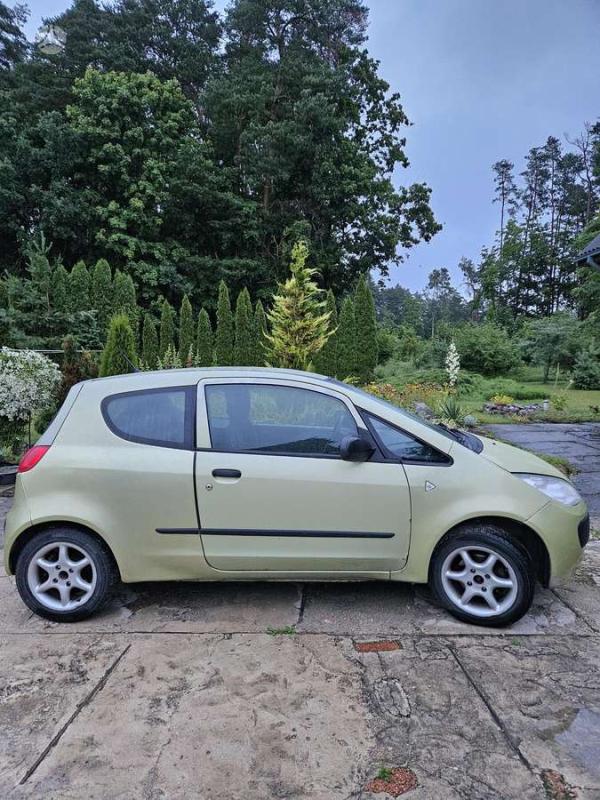 Zaļš Mitsubishi Colt 2005 Viļņa, ar dzinēja tilpumu 1.49 L un nobraukumu 318 tūkst. km par 1200 €, foto 4 vietnē AUTOMOTO.COM.LV