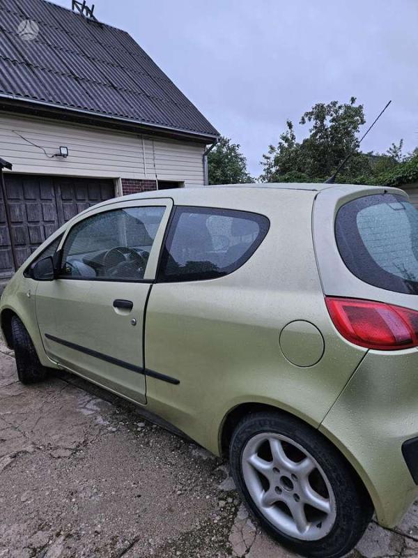 Zaļš Mitsubishi Colt 2005 Viļņa, ar dzinēja tilpumu 1.49 L un nobraukumu 318 tūkst. km par 1200 €, foto 6 vietnē AUTOMOTO.COM.LV