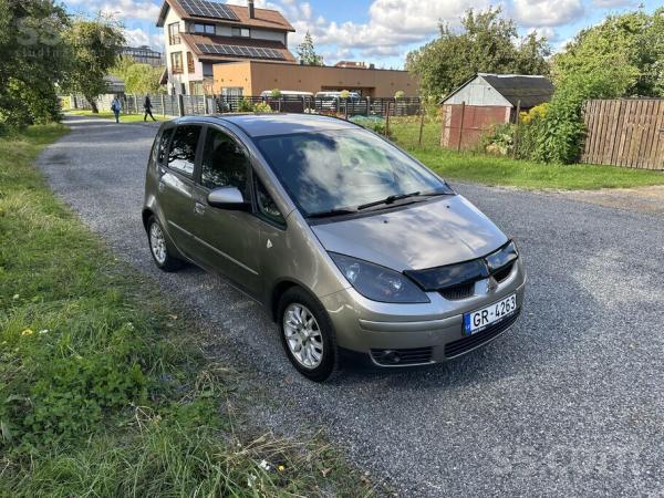 Green Mitsubishi Colt 2007 in Riga, with an engine capacity of 1.30 L and mileage of 165 thousand km for 1300 €, photo 3 on AUTOMOTO.COM.LV