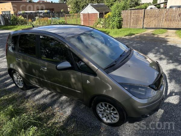 Green Mitsubishi Colt 2007 in Riga, with an engine capacity of 1.30 L and mileage of 165 thousand km for 1300 €, photo 4 on AUTOMOTO.COM.LV