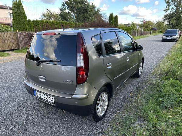 Green Mitsubishi Colt 2007 in Riga, with an engine capacity of 1.30 L and mileage of 165 thousand km for 1300 €, photo 6 on AUTOMOTO.COM.LV