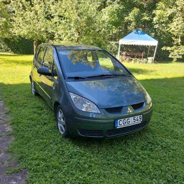 Green Mitsubishi Colt 2007 in Vilnius, with an engine capacity of 1.33 L and mileage of 131 thousand km for 550 €, photo 1 on AUTOMOTO.COM.LV
