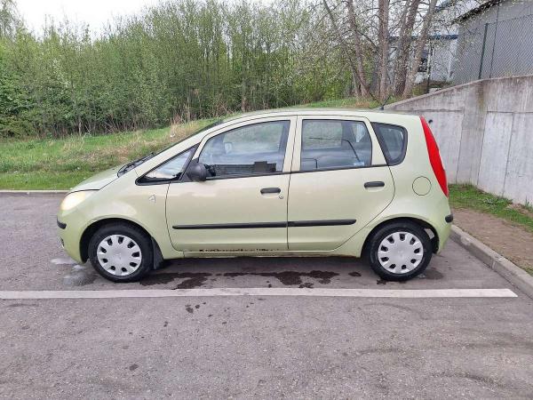 Green Mitsubishi Colt 2005 in Vilnius, with an engine capacity of 1.33 L and mileage of 157 thousand km for 500 €, photo 4 on AUTOMOTO.COM.LV