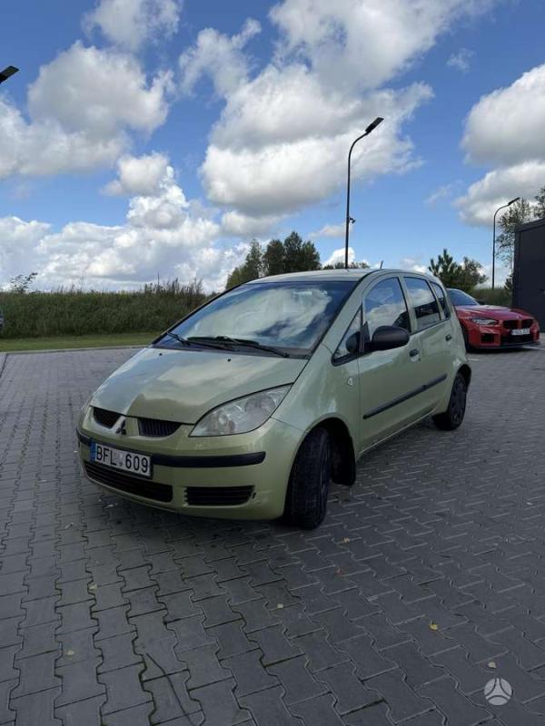 Zaļš Mitsubishi Colt 2005 Kauņa, ar dzinēja tilpumu 1.33 L un nobraukumu 159 tūkst. km par 599 €, foto 1 vietnē AUTOMOTO.COM.LV