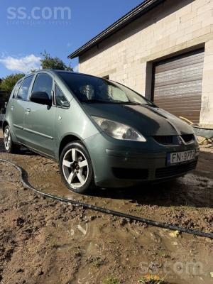 Zaļš Mitsubishi Colt 2005 Rēzekne, ar dzinēja tilpumu 1.40 L un nobraukumu 234 tūkst. km par 1300 €, foto  vietnē AUTOMOTO.COM.LV