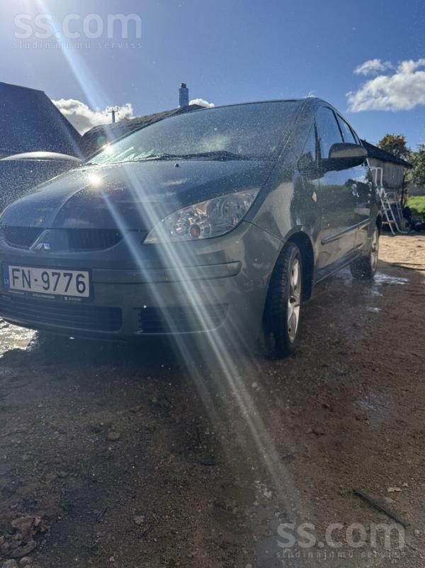 Green Mitsubishi Colt 2005 in Rezekne, with an engine capacity of 1.40 L and mileage of 234 thousand km for 1300 €, photo 3 on AUTOMOTO.COM.LV
