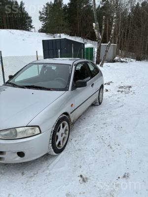Grey Mitsubishi Colt 1999 in Riga, with an engine capacity of 1.60 L and mileage of 0 thousand km for 1050 €, photo 2 on AUTOMOTO.COM.LV