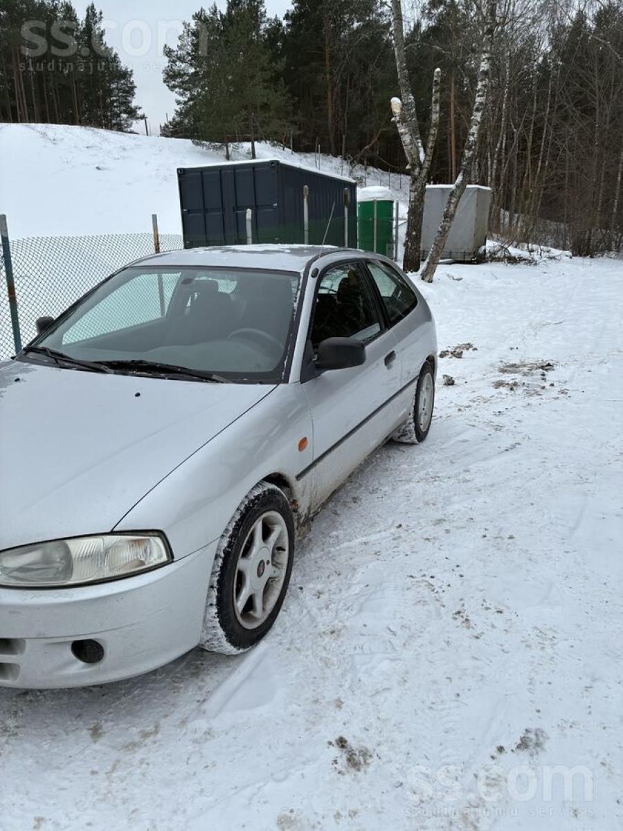 Grey Mitsubishi Colt 1999 in Riga, with an engine capacity of 1.60 L and mileage of 0 thousand km for 1050 €, photo 2 on AUTOMOTO.COM.LV
