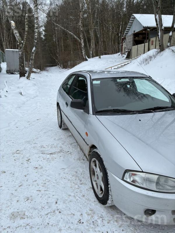 Grey Mitsubishi Colt 1999 in Riga, with an engine capacity of 1.60 L and mileage of 0 thousand km for 1050 €, photo 3 on AUTOMOTO.COM.LV
