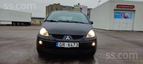 Pelēks Mitsubishi Colt 2007 Rīga, ar dzinēja tilpumu 1.30 L un nobraukumu 303 tūkst. km par 1600 €, foto 9 vietnē AUTOMOTO.COM.LV