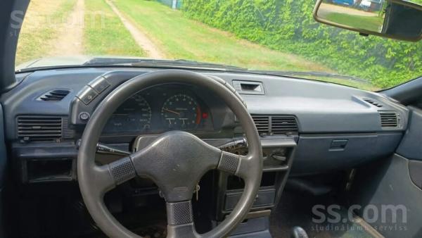 Pelēks Mitsubishi Colt 1990 Rīga, ar dzinēja tilpumu 1.50 L un nobraukumu 257 tūkst. km par 1000 €, foto 6 vietnē AUTOMOTO.COM.LV