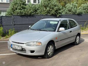 Pelēks Mitsubishi Colt 1997 Viļņa, ar dzinēja tilpumu 1.30 L un nobraukumu 168 tūkst. km par 999 €, foto  vietnē AUTOMOTO.COM.LV