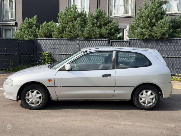 Mitsubishi Colt 1997 Viļņa vietnē Pelēks Mitsubishi Colt 1997 Viļņa, ar dzinēja tilpumu 1.30 L un nobraukumu 168 tūkst. km par 999 €, foto 4 vietnē AUTOMOTO.COM.LV