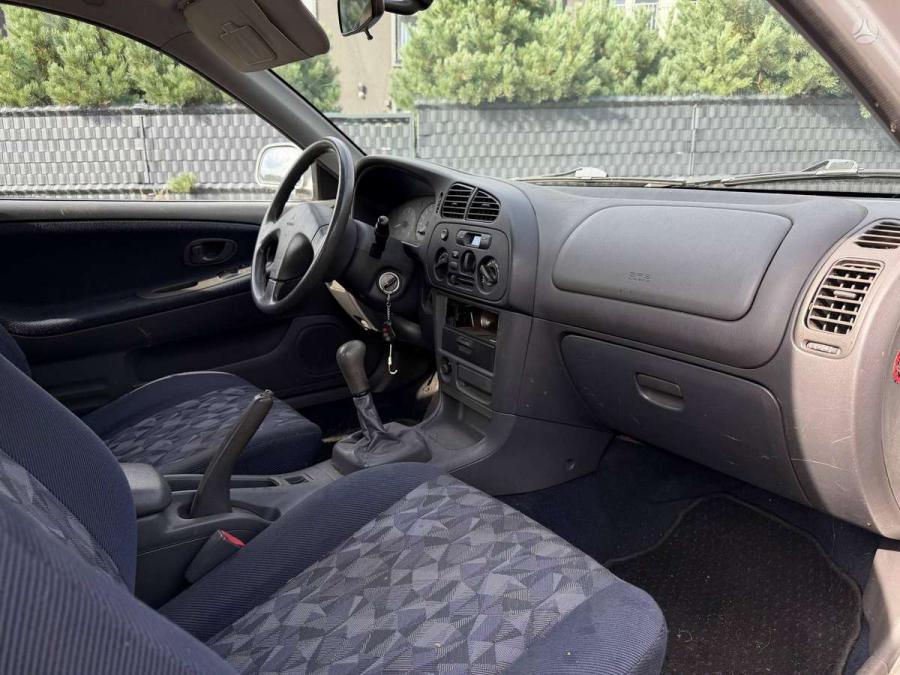 Pelēks Mitsubishi Colt 1997 Viļņa, ar dzinēja tilpumu 1.30 L un nobraukumu 168 tūkst. km par 999 €, foto 13 vietnē AUTOMOTO.COM.LV