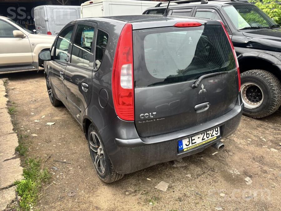 Pelēks Mitsubishi Colt 2004 Rīga, ar dzinēja tilpumu 1.30 L un nobraukumu 204 tūkst. km par 450 €, foto 4 vietnē AUTOMOTO.COM.LV