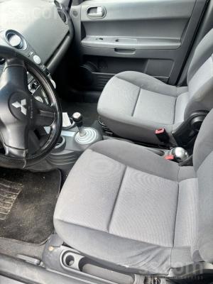 Pelēks Mitsubishi Colt 2004 Rīga, ar dzinēja tilpumu 1.30 L un nobraukumu 204 tūkst. km par 450 €, foto 6 vietnē AUTOMOTO.COM.LV
