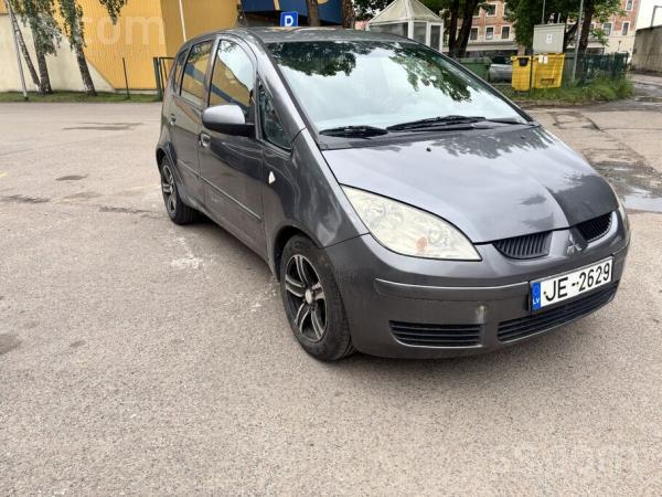 Серый Мицубиси Кольт 2004 в Рига, объемом двигателя 1.30 л и пробегом 204 тыс. км за 700 €, фото 3 на AUTOMOTO.COM.LV
