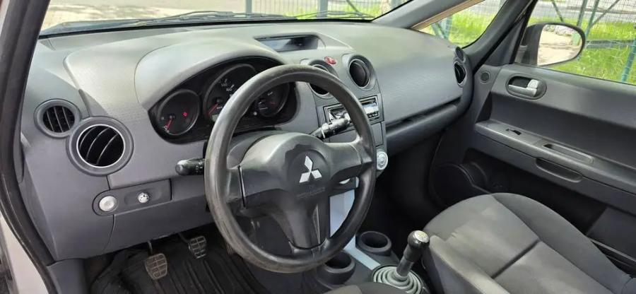 Pelēks Mitsubishi Colt 2004 Valmiera, ar dzinēja tilpumu 1.50 L un nobraukumu 245 tūkst. km par 1100 €, foto 9 vietnē AUTOMOTO.COM.LV