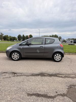 Grey Mitsubishi Colt 2005 in Jonava, with an engine capacity of 1.10 L and mileage of 180 thousand km for 1399 €, photo 3 on AUTOMOTO.COM.LV