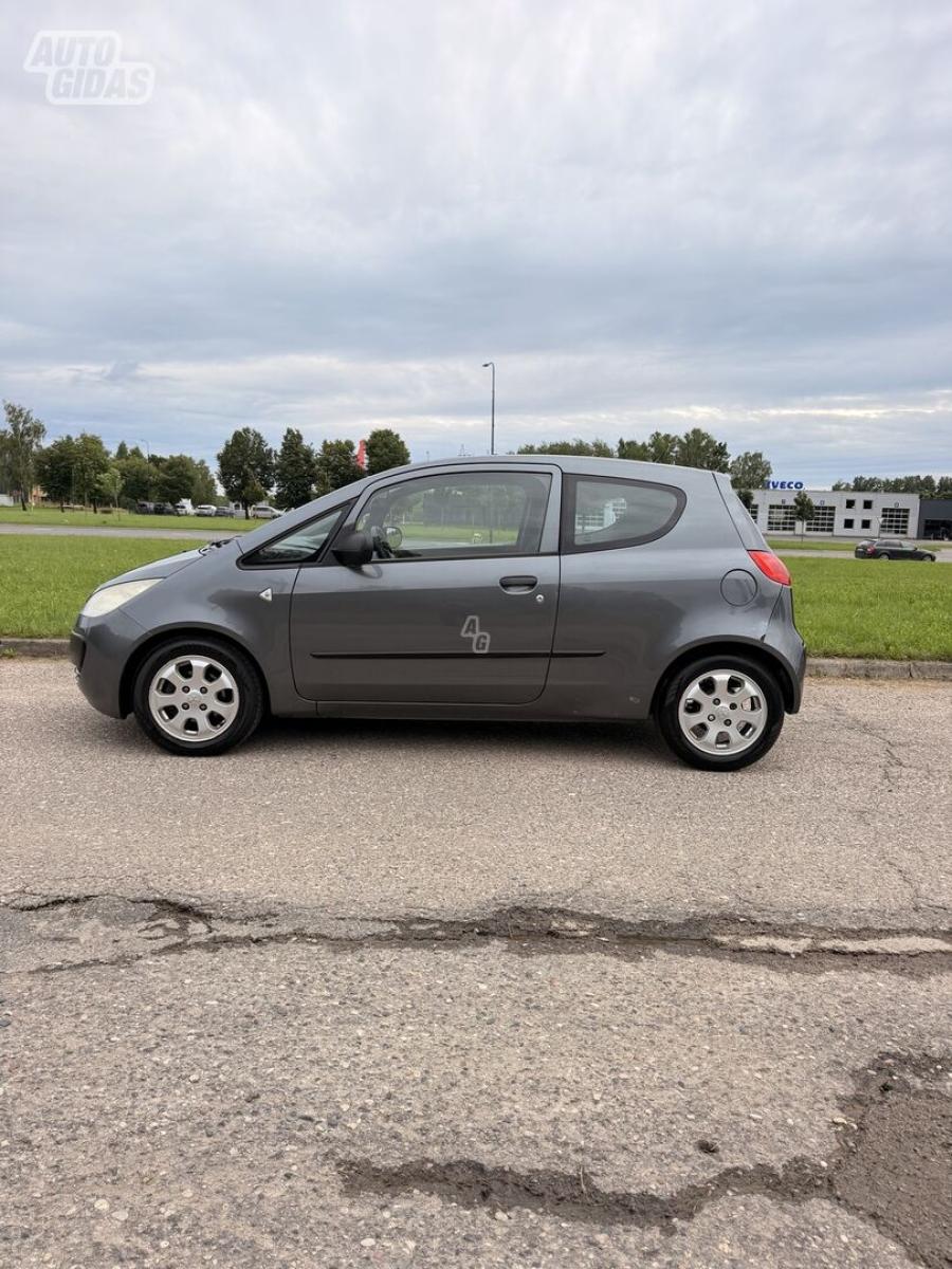 Grey Mitsubishi Colt 2005 in Jonava, with an engine capacity of 1.10 L and mileage of 180 thousand km for 1399 €, photo 3 on AUTOMOTO.COM.LV
