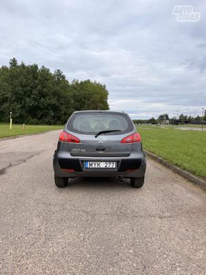 Grey Mitsubishi Colt 2005 in Jonava, with an engine capacity of 1.10 L and mileage of 180 thousand km for 1399 €, photo 5 on AUTOMOTO.COM.LV