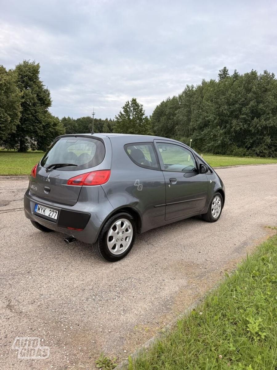 Grey Mitsubishi Colt 2005 in Jonava, with an engine capacity of 1.10 L and mileage of 180 thousand km for 1399 €, photo 6 on AUTOMOTO.COM.LV