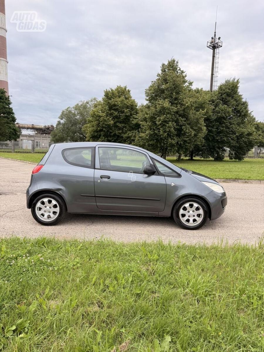 Grey Mitsubishi Colt 2005 in Jonava, with an engine capacity of 1.10 L and mileage of 180 thousand km for 1399 €, photo 7 on AUTOMOTO.COM.LV