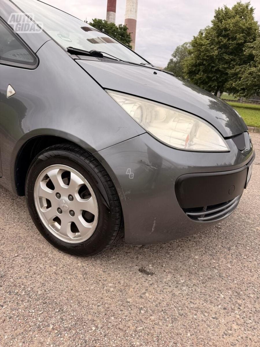 Grey Mitsubishi Colt 2005 in Jonava, with an engine capacity of 1.10 L and mileage of 180 thousand km for 1399 €, photo 8 on AUTOMOTO.COM.LV