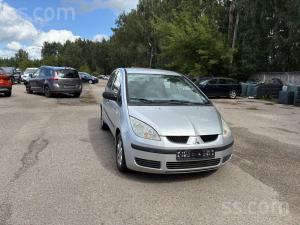 Pelēks Mitsubishi Colt 2005 Rīga, ar dzinēja tilpumu 1.30 L un nobraukumu 0 tūkst. km par 2150 €, foto  vietnē AUTOMOTO.COM.LV