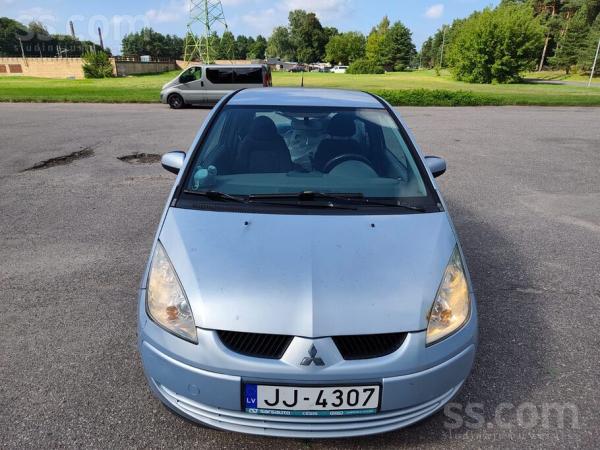 Pelēks Mitsubishi Colt 2005 Rīga, ar dzinēja tilpumu 1.30 L un nobraukumu 226 tūkst. km par 800 €, foto 5 vietnē AUTOMOTO.COM.LV