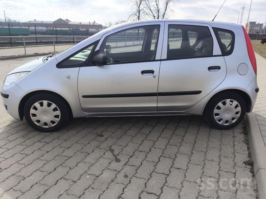 Grey Mitsubishi Colt 2006 in Aizkraukle, with an engine capacity of 1.30 L and mileage of 159 thousand km for 1500 €, photo 6 on AUTOMOTO.COM.LV