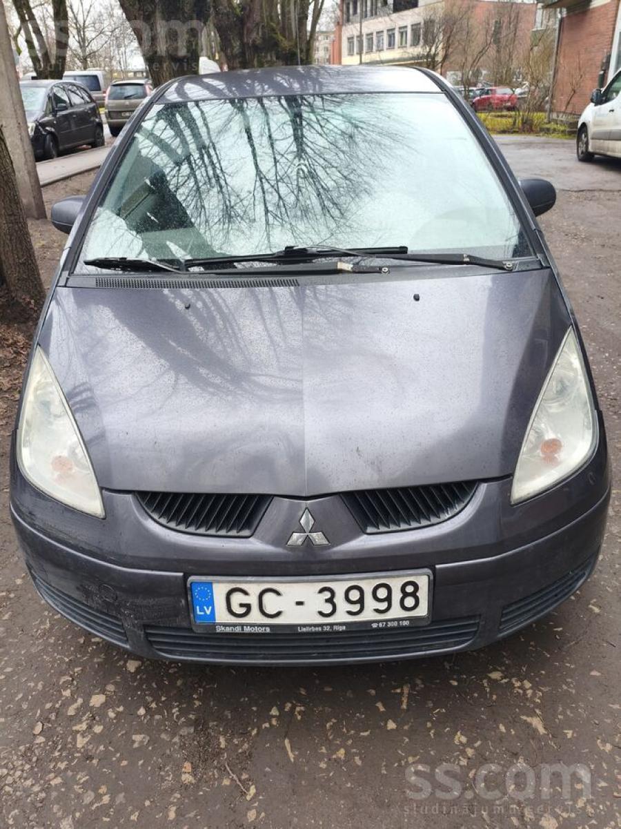 Grey Mitsubishi Colt 2006 in Riga, with an engine capacity of 1.30 L and mileage of 256 thousand km for 395 €, photo 1 on AUTOMOTO.COM.LV