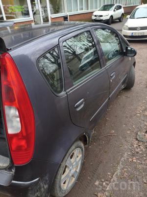 Grey Mitsubishi Colt 2006 in Riga, with an engine capacity of 1.30 L and mileage of 256 thousand km for 395 €, photo 4 on AUTOMOTO.COM.LV