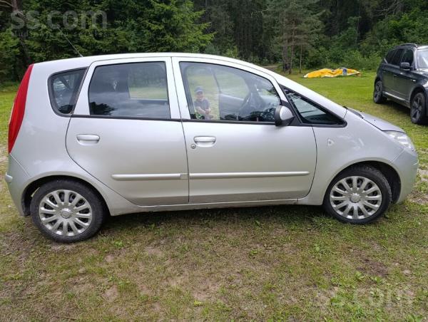 Pelēks Mitsubishi Colt 2006 Talsi, ar dzinēja tilpumu 1.30 L un nobraukumu 192 tūkst. km par 850 €, foto 10 vietnē AUTOMOTO.COM.LV