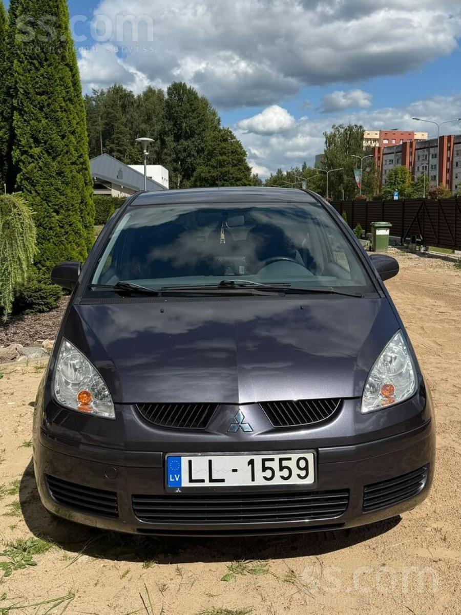 Pelēks Mitsubishi Colt 2006 Rīga, ar dzinēja tilpumu 1.30 L un nobraukumu 85 tūkst. km par 1200 €, foto 4 vietnē AUTOMOTO.COM.LV