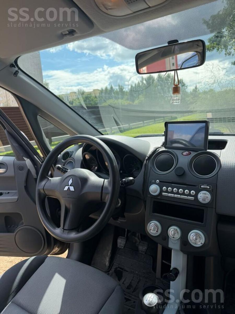 Pelēks Mitsubishi Colt 2006 Rīga, ar dzinēja tilpumu 1.30 L un nobraukumu 85 tūkst. km par 1200 €, foto 13 vietnē AUTOMOTO.COM.LV