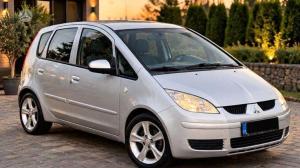 Pelēks Mitsubishi Colt 2006 Viļņa, ar dzinēja tilpumu 1.33 L un nobraukumu 122 tūkst. km par 1450 €, foto  vietnē AUTOMOTO.COM.LV