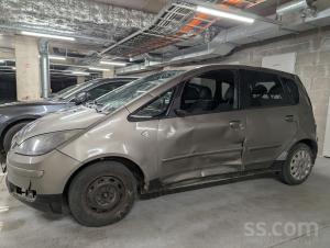 Grey Mitsubishi Colt 2007 in Riga, with an engine capacity of 1.30 L and mileage of 239 thousand km for 170 €, photo 3 on AUTOMOTO.COM.LV