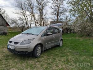 Grey Mitsubishi Colt 2007 in Riga, with an engine capacity of 1.30 L and mileage of 239 thousand km for 170 €, photo 5 on AUTOMOTO.COM.LV
